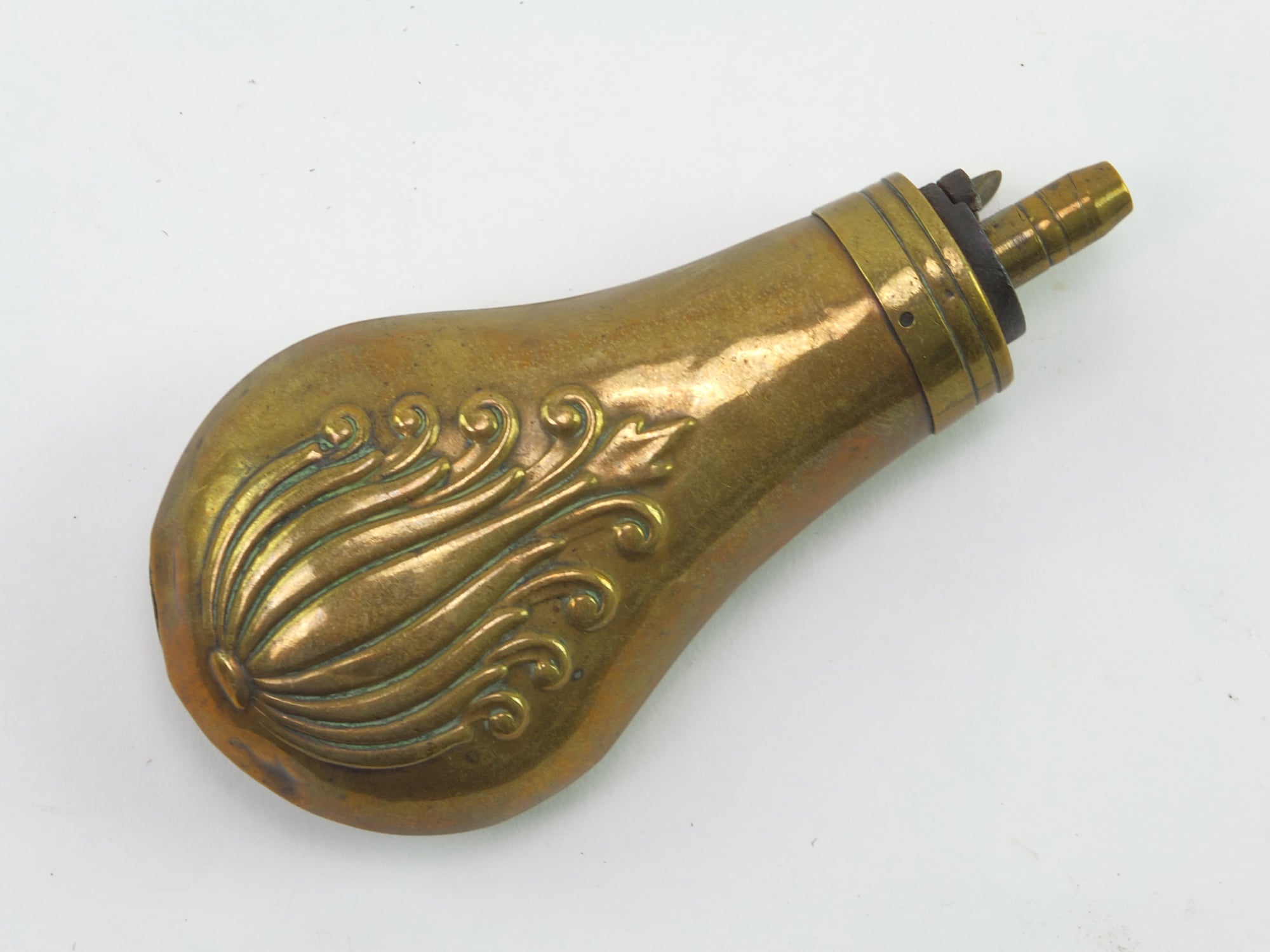 A Small Pistol Bag Shaped Embossed Powder Flask. SN X1898 – West Street ...